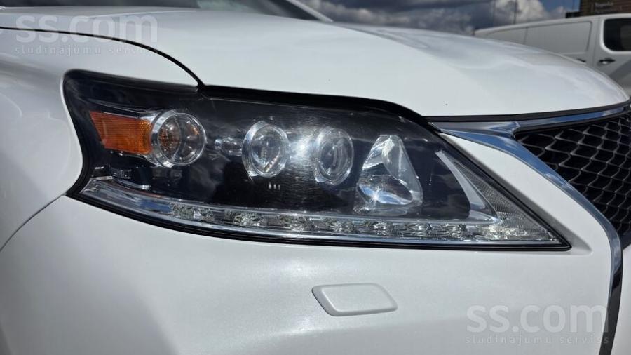 White Lexus RX 2014 in Riga, with an engine capacity of 3.50 L and mileage of 190 thousand km for 16900 €, photo 13 on AUTOMOTO.COM.LV