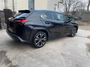 Black Lexus UX 250h 2019 in Siauliai, with an engine capacity of 2.00 L and mileage of 118 thousand km for 19350 €, photo 4 on AUTOMOTO.COM.LV