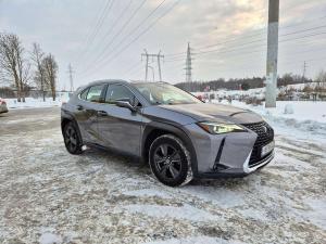 Grey Lexus UX 250h 2020 in Siauliai, with an engine capacity of 1.99 L and mileage of 135 thousand km for 20500 €, photo  on AUTOMOTO.COM.LV