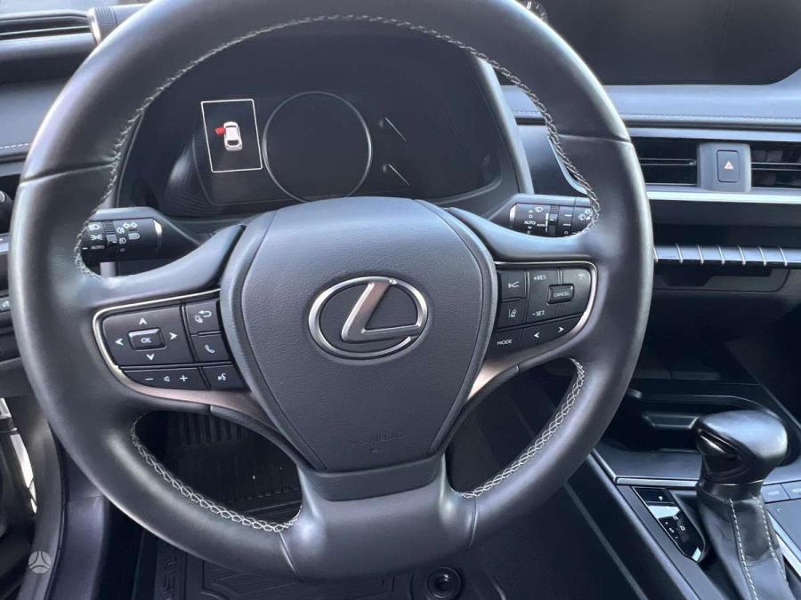 Grey Lexus UX 250h 2022 in Taurage, with an engine capacity of 2.00 L and mileage of 32 thousand km for 24499 €, photo 22 on AUTOMOTO.COM.LV