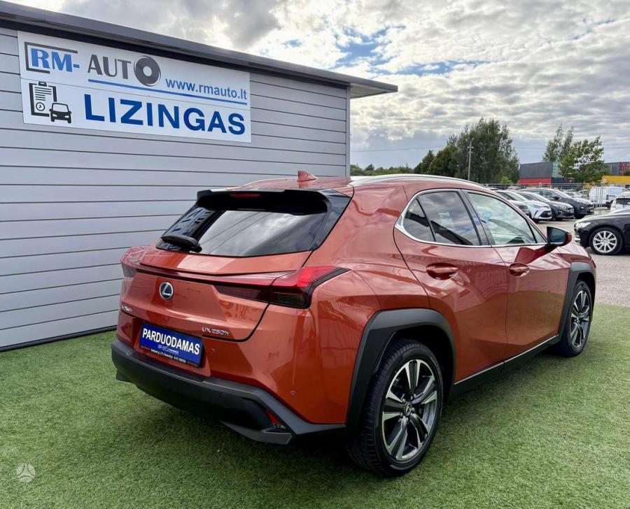 Orange Lexus UX 250h 2019 in Panevezys, with an engine capacity of 1.99 L and mileage of 321 thousand km for 16500 €, photo 6 on AUTOMOTO.COM.LV