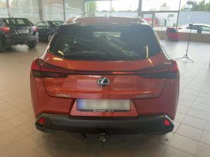 Orange Lexus UX 250h 2019 in Vilnius, with an engine capacity of 1.99 L and mileage of 204 thousand km for 19900 €, photo 6 on AUTOMOTO.COM.LV