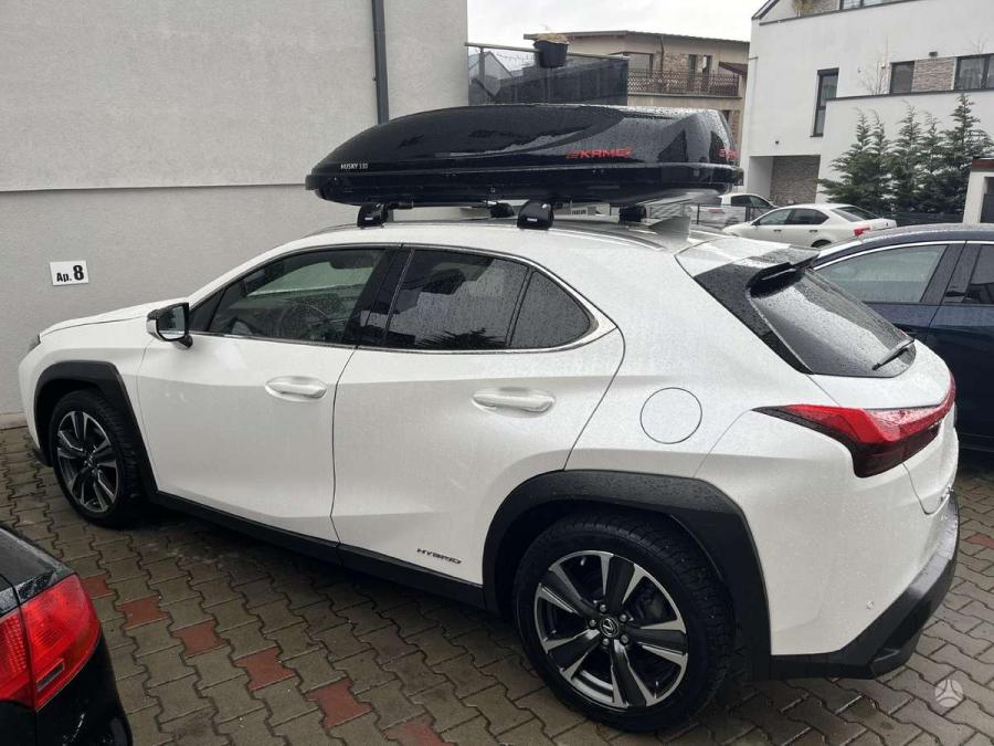 White Lexus UX 250h 2020 in Panevezys, with an engine capacity of 1.99 L and mileage of 65 thousand km for 21500 €, photo 1 on AUTOMOTO.COM.LV