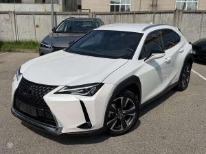 White Lexus UX 250h 2020 in Vilnius, with an engine capacity of 1.99 L and mileage of 97 thousand km for 22300 €, photo  on AUTOMOTO.COM.LV