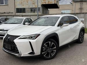 White Lexus UX 250h 2020 in Vilnius, with an engine capacity of 1.99 L and mileage of 97 thousand km for 21800 €, photo  on AUTOMOTO.COM.LV