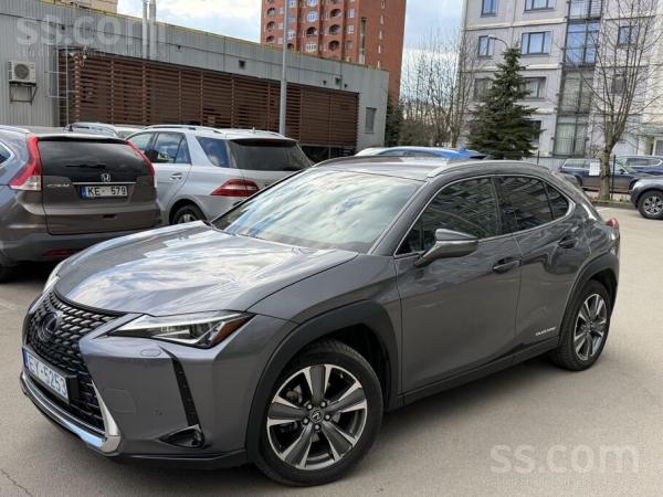 Pelēks Lexus UX 300e 2022 Rīga, ar dzinēja tilpumu 0.00 L un nobraukumu 22 tūkst. km par 25500 €, foto 1 vietnē AUTOMOTO.COM.LV