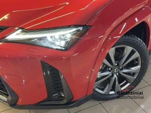 Red Lexus UX 300h 2024 in Vilnius, with an engine capacity of 1.99 L and mileage of 6 thousand km for 42550 €, photo 39 on AUTOMOTO.COM.LV