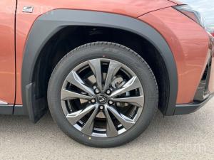 Brown Lexus UX 2025 in Riga, with an engine capacity of 2.00 L and mileage of 7 thousand km for 41900 €, photo 16 on AUTOMOTO.COM.LV