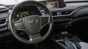 White Lexus UX 2021 in Riga, with an engine capacity of 2.00 L and mileage of 56 thousand km for 25590 €, photo 14 on AUTOMOTO.COM.LV