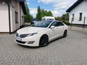 Yellow Lincoln MKZ 2015 in Alytus, with an engine capacity of 2.00 L and mileage of 109 thousand km for 7749 €, photo  on AUTOMOTO.COM.LV