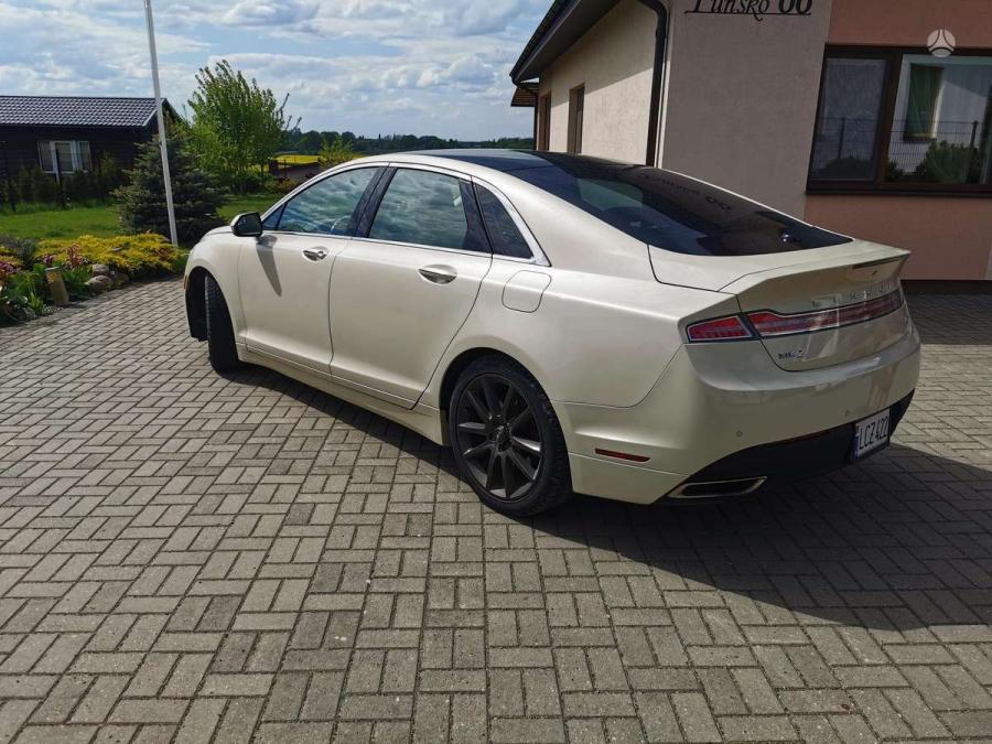 Yellow Lincoln MKZ 2015 in Alytus, with an engine capacity of 2.00 L and mileage of 109 thousand km for 7749 €, photo 4 on AUTOMOTO.COM.LV