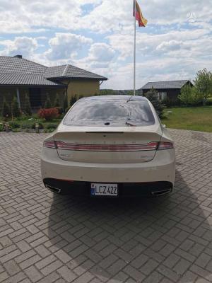 Yellow Lincoln MKZ 2015 in Alytus, with an engine capacity of 2.00 L and mileage of 109 thousand km for 7749 €, photo 5 on AUTOMOTO.COM.LV