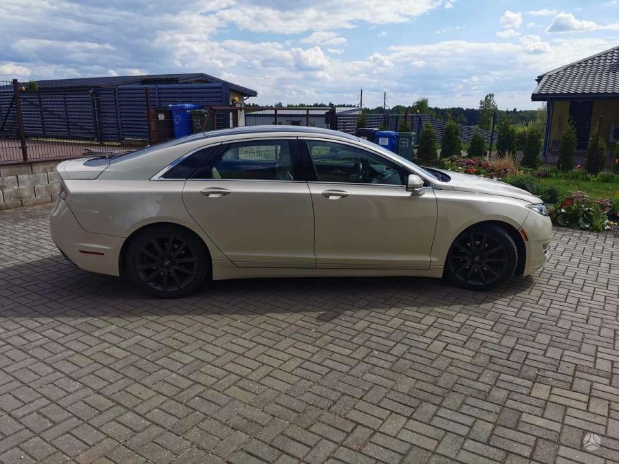 Yellow Lincoln MKZ 2015 in Alytus, with an engine capacity of 2.00 L and mileage of 109 thousand km for 7749 €, photo 7 on AUTOMOTO.COM.LV