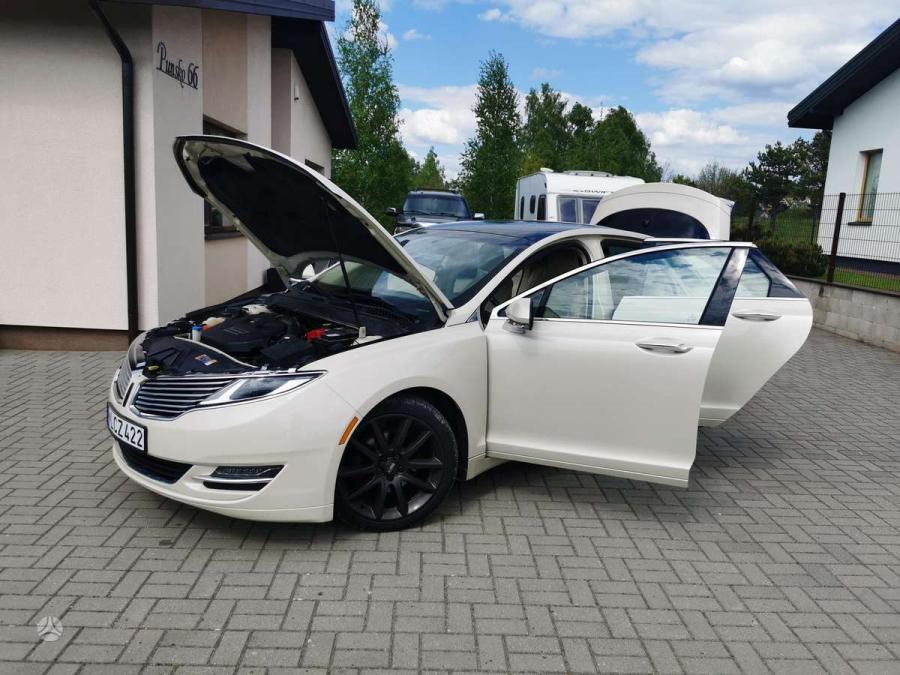 Yellow Lincoln MKZ 2015 in Alytus, with an engine capacity of 2.00 L and mileage of 109 thousand km for 7749 €, photo 10 on AUTOMOTO.COM.LV