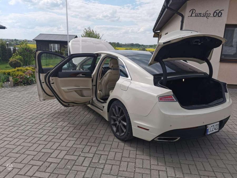 Yellow Lincoln MKZ 2015 in Alytus, with an engine capacity of 2.00 L and mileage of 109 thousand km for 7749 €, photo 12 on AUTOMOTO.COM.LV