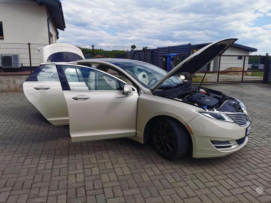 Yellow Lincoln MKZ 2015 in Alytus, with an engine capacity of 2.00 L and mileage of 109 thousand km for 7749 €, photo 16 on AUTOMOTO.COM.LV