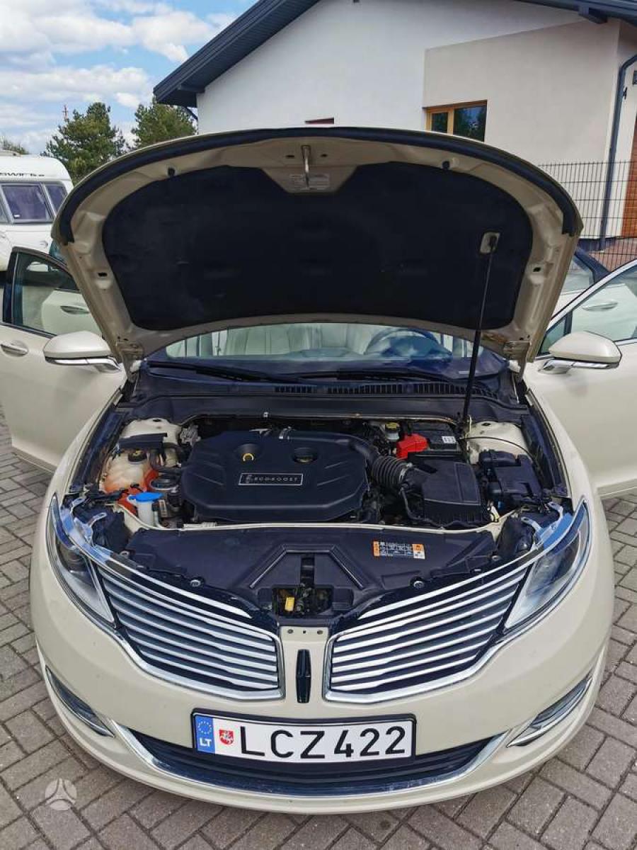 Yellow Lincoln MKZ 2015 in Alytus, with an engine capacity of 2.00 L and mileage of 109 thousand km for 7749 €, photo 17 on AUTOMOTO.COM.LV