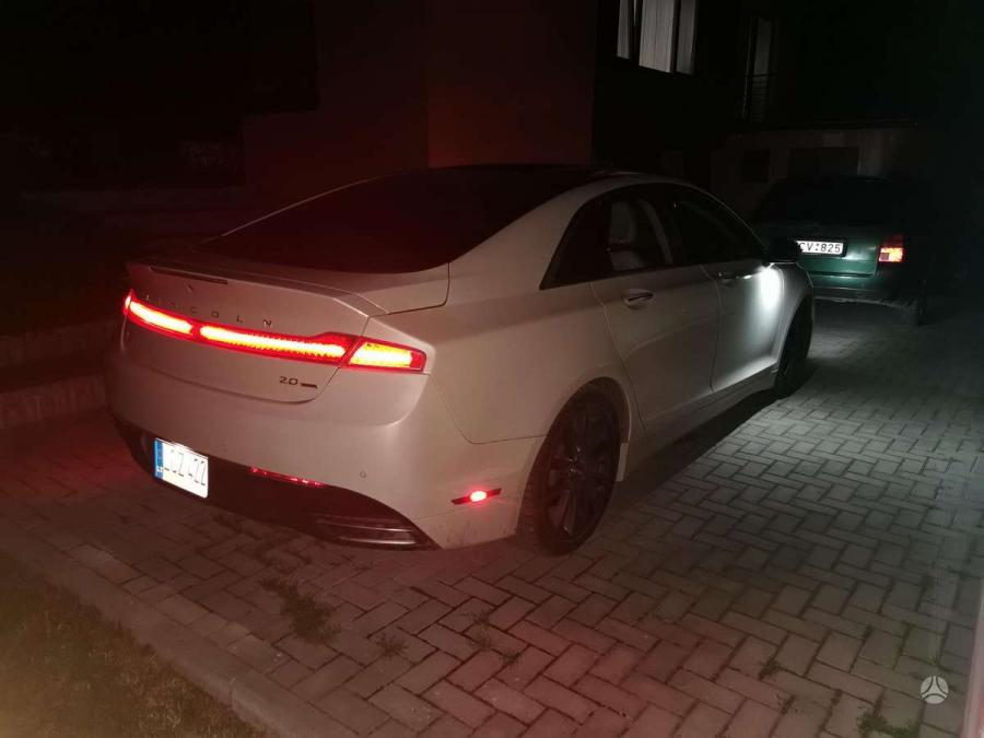 Yellow Lincoln MKZ 2015 in Alytus, with an engine capacity of 2.00 L and mileage of 109 thousand km for 7749 €, photo 21 on AUTOMOTO.COM.LV