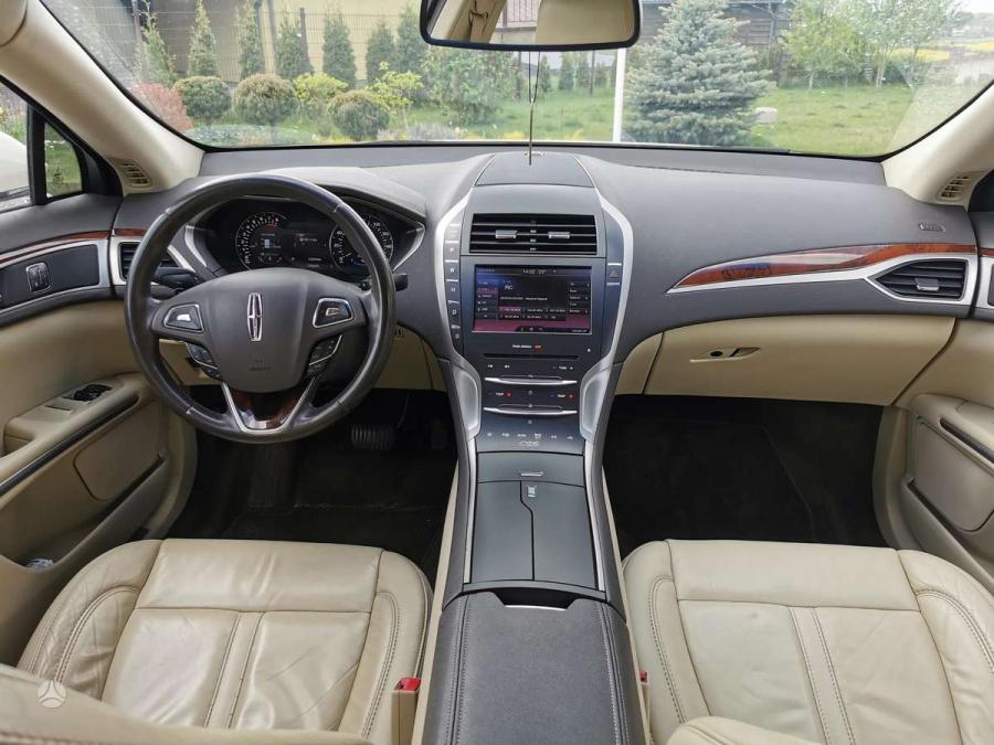 Yellow Lincoln MKZ 2015 in Alytus, with an engine capacity of 2.00 L and mileage of 109 thousand km for 7749 €, photo 25 on AUTOMOTO.COM.LV