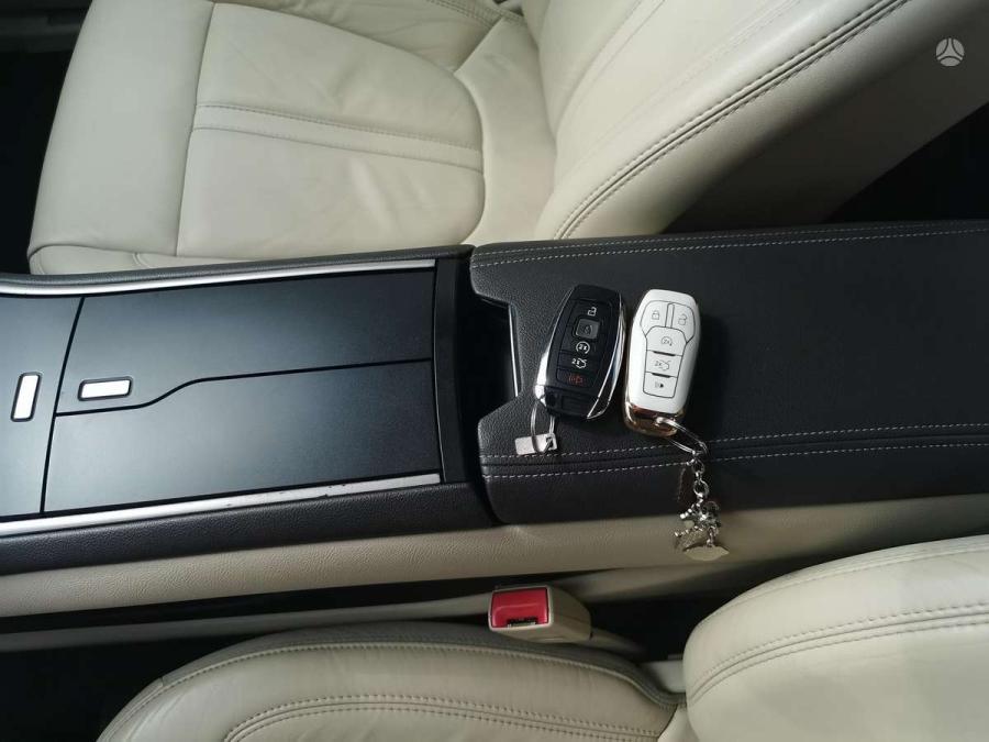 Yellow Lincoln MKZ 2015 in Alytus, with an engine capacity of 2.00 L and mileage of 109 thousand km for 7749 €, photo 27 on AUTOMOTO.COM.LV