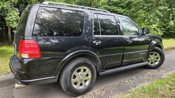 Melns Lincoln Navigator 2003 Rīga, ar dzinēja tilpumu 5.50 L un nobraukumu 228 tūkst. km par 11000 €, foto 1 vietnē AUTOMOTO.COM.LV