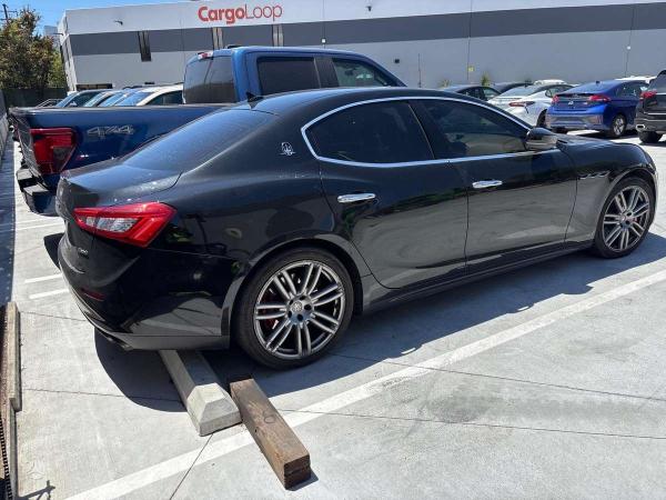 Black Maserati Ghibli 2017 in Kaunas, with an engine capacity of 2.98 L and mileage of 138 thousand km for 11300 €, photo 7 on AUTOMOTO.COM.LV