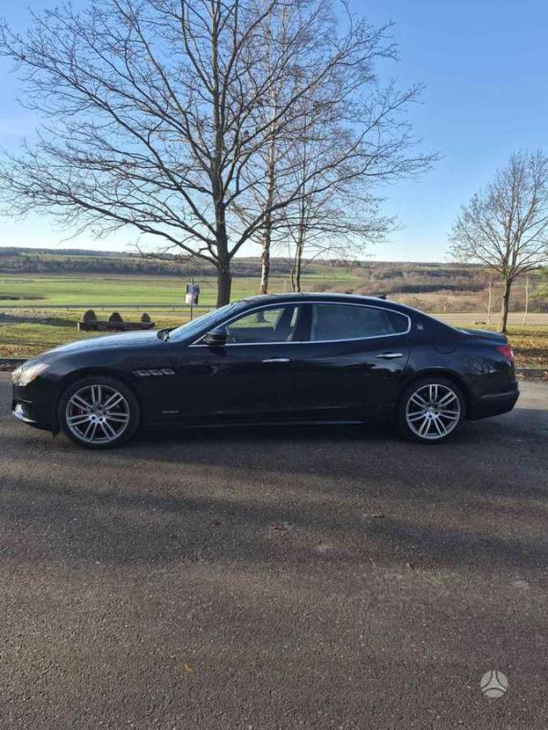 Black Maserati Quattroporte 2017 in Kaunas, with an engine capacity of 2.98 L and mileage of 85 thousand km for 25900 €, photo 5 on AUTOMOTO.COM.LV