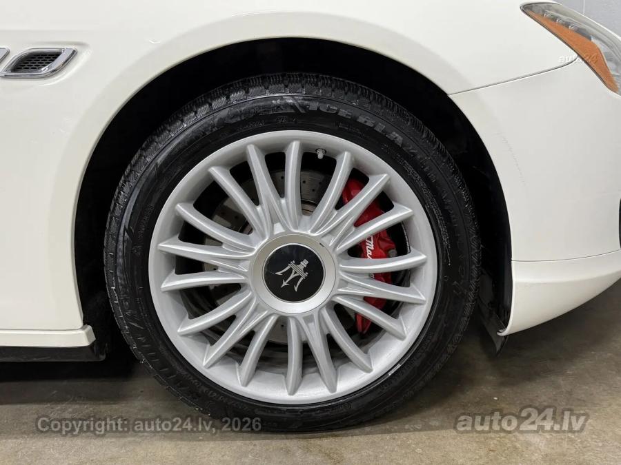 White Maserati Quattroporte 2014 in Tallinn, with an engine capacity of 3.00 L and mileage of 63 thousand km for 19995 €, photo 6 on AUTOMOTO.COM.LV