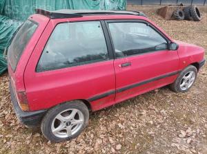Sarkans Mazda 121 1989 Kuldīga, ar dzinēja tilpumu 1.20 L un nobraukumu 0 tūkst. km par 600 €, foto 8 vietnē AUTOMOTO.COM.LV