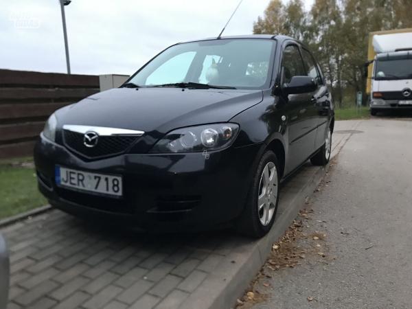 Black Mazda 2 2006 in Alytus, with an engine capacity of 1.40 L and mileage of 240 thousand km for 1199 €, photo 1 on AUTOMOTO.COM.LV