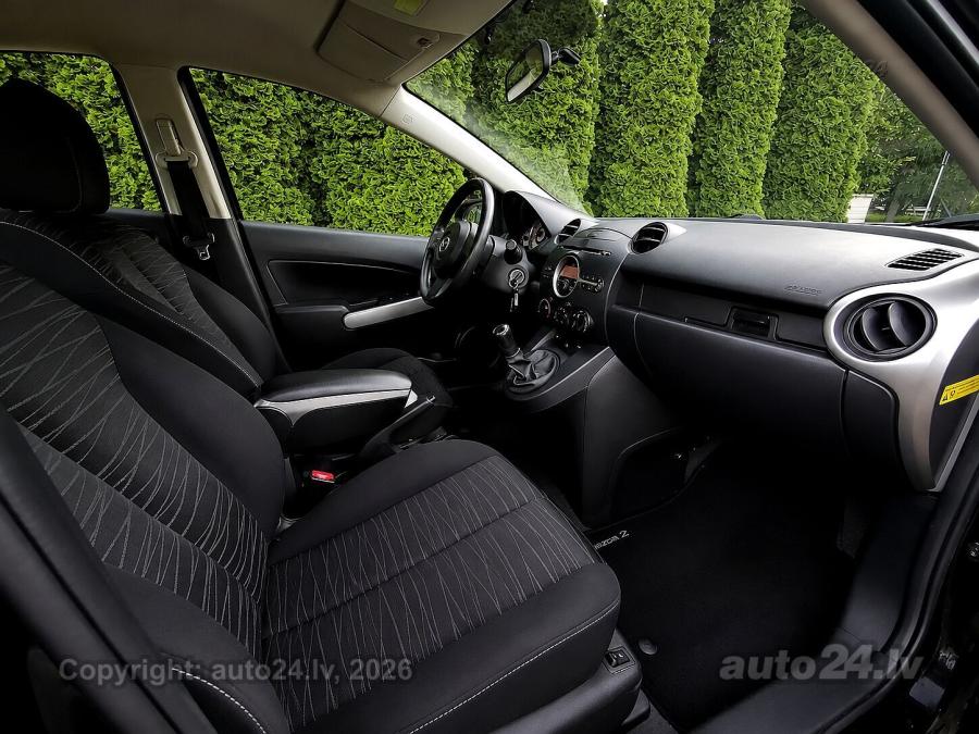 Black Mazda 2 2008 in Tartu, with an engine capacity of 1.30 L and mileage of 95 thousand km for 1200 €, photo 6 on AUTOMOTO.COM.LV