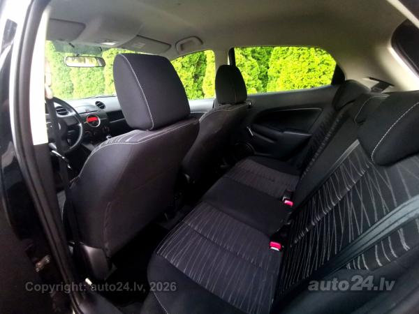Black Mazda 2 2008 in Tartu, with an engine capacity of 1.30 L and mileage of 95 thousand km for 1200 €, photo 6 on AUTOMOTO.COM.LV