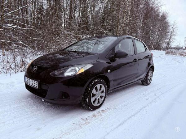 Black Mazda 2 2009 in Vilnius, with an engine capacity of 1.35 L and mileage of 170 thousand km for 1850 €, photo 1 on AUTOMOTO.COM.LV