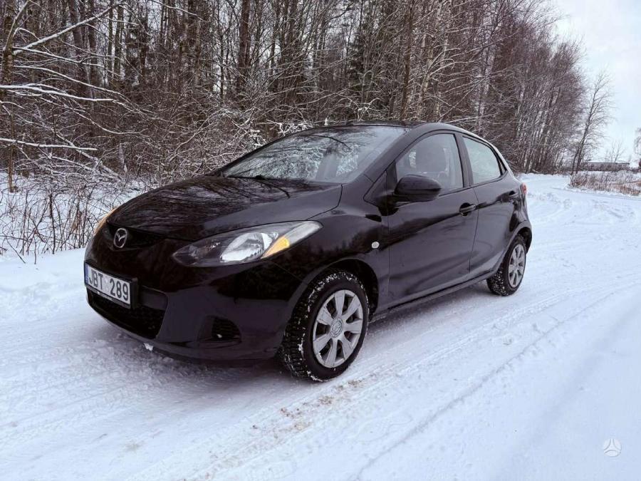 Black Mazda 2 2009 in Vilnius, with an engine capacity of 1.35 L and mileage of 170 thousand km for 1850 €, photo 1 on AUTOMOTO.COM.LV