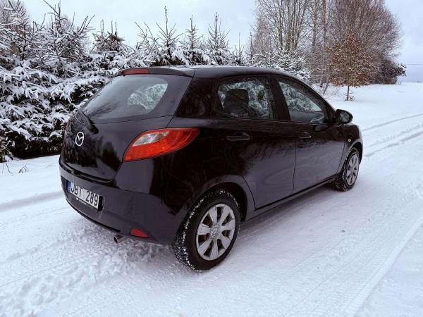 Black Mazda 2 2009 in Vilnius, with an engine capacity of 1.35 L and mileage of 170 thousand km for 1850 €, photo 6 on AUTOMOTO.COM.LV