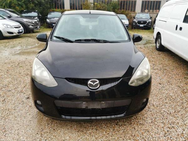 Black Mazda 2 2009 in Panevezys, with an engine capacity of 1.40 L and mileage of 240 thousand km for 2350 €, photo 3 on AUTOMOTO.COM.LV