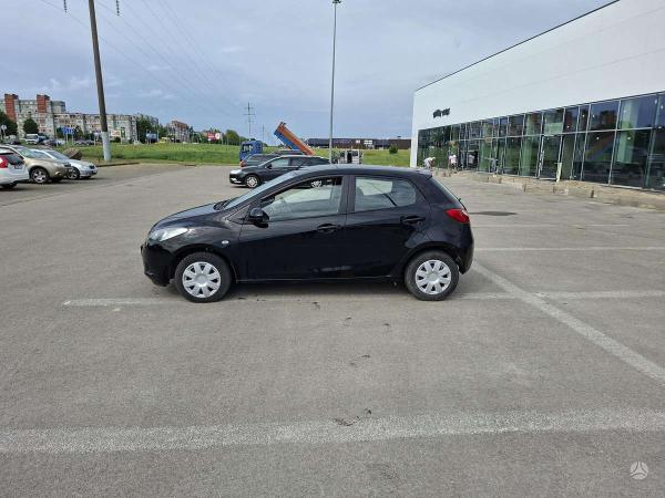 Black Mazda 2 2010 in Siauliai, with an engine capacity of 1.40 L and mileage of 250 thousand km for 1700 €, photo 1 on AUTOMOTO.COM.LV