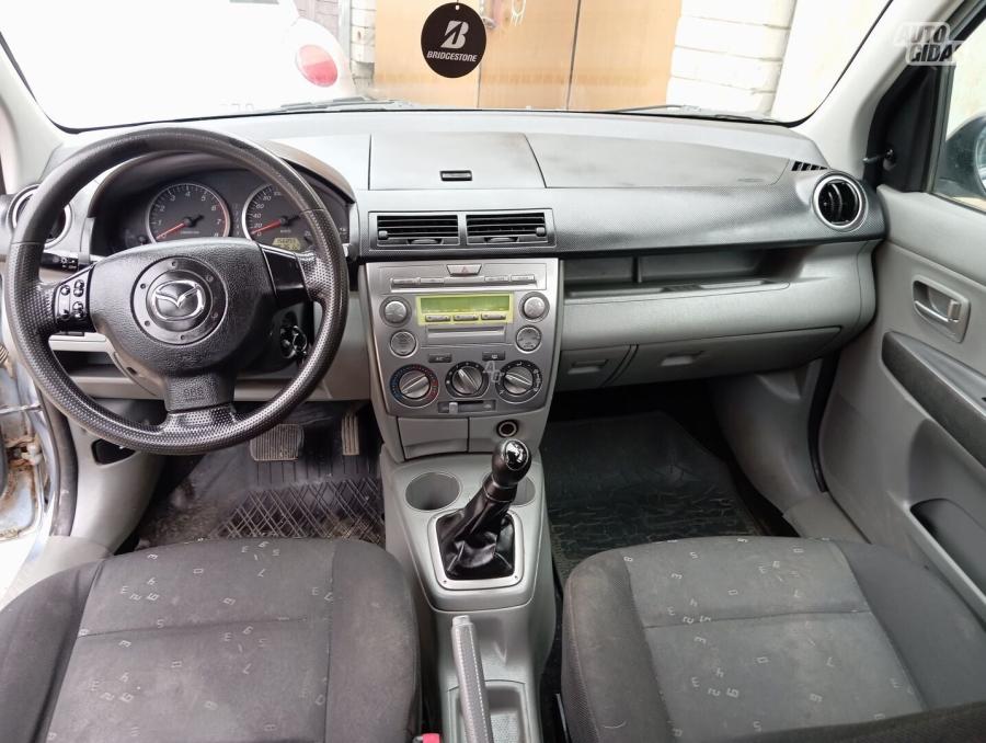 Zils Mazda 2 2005 Panevēža, ar dzinēja tilpumu 1.40 L un nobraukumu 156 tūkst. km par 1250 €, foto 12 vietnē AUTOMOTO.COM.LV