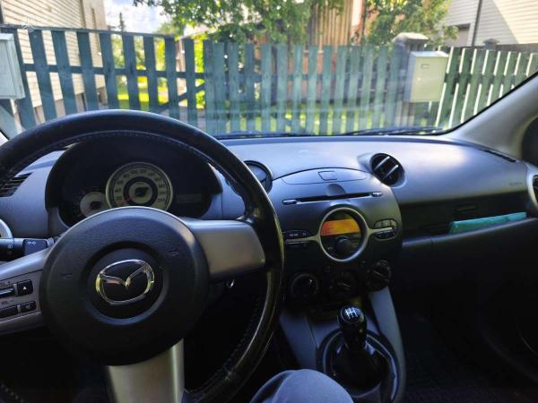 Blue Mazda 2 2008 in Kaunas, with an engine capacity of 1.40 L and mileage of 194 thousand km for 800 €, photo 5 on AUTOMOTO.COM.LV