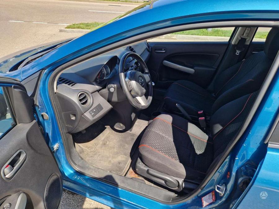 Blue Mazda 2 2010 in Vilnius, with an engine capacity of 1.35 L and mileage of 166 thousand km for 1470 €, photo 12 on AUTOMOTO.COM.LV