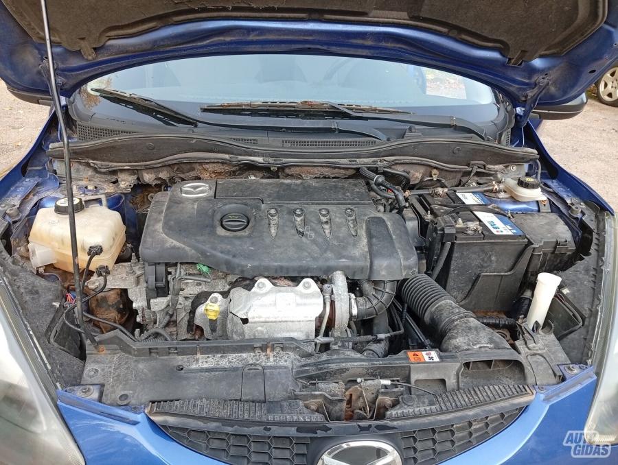 Blue Mazda 2 2011 in Klaipeda, with an engine capacity of 1.40 L and mileage of 195 thousand km for 1400 €, photo 10 on AUTOMOTO.COM.LV
