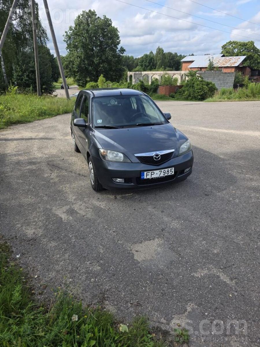 Zils Mazda 2 2005 Rīga, ar dzinēja tilpumu 1.40 L un nobraukumu 190 tūkst. km par 300 €, foto 6 vietnē AUTOMOTO.COM.LV