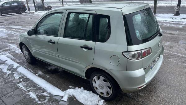 Green Mazda 2 2006 in Vilnius, with an engine capacity of 1.40 L and mileage of 184 thousand km for 1150 €, photo 3 on AUTOMOTO.COM.LV