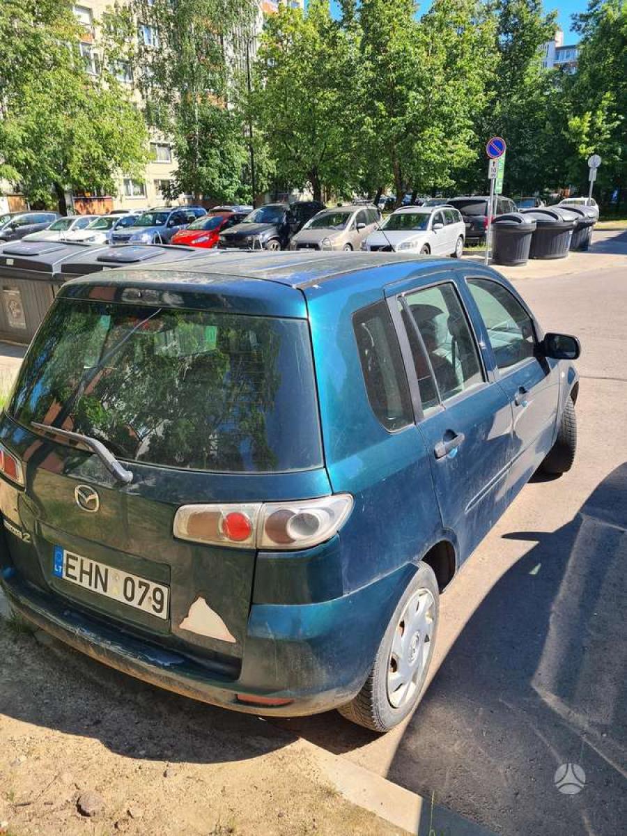 Green Mazda 2 2006 in Vilnius, with an engine capacity of 1.40 L and mileage of 195 thousand km for 500 €, photo 3 on AUTOMOTO.COM.LV