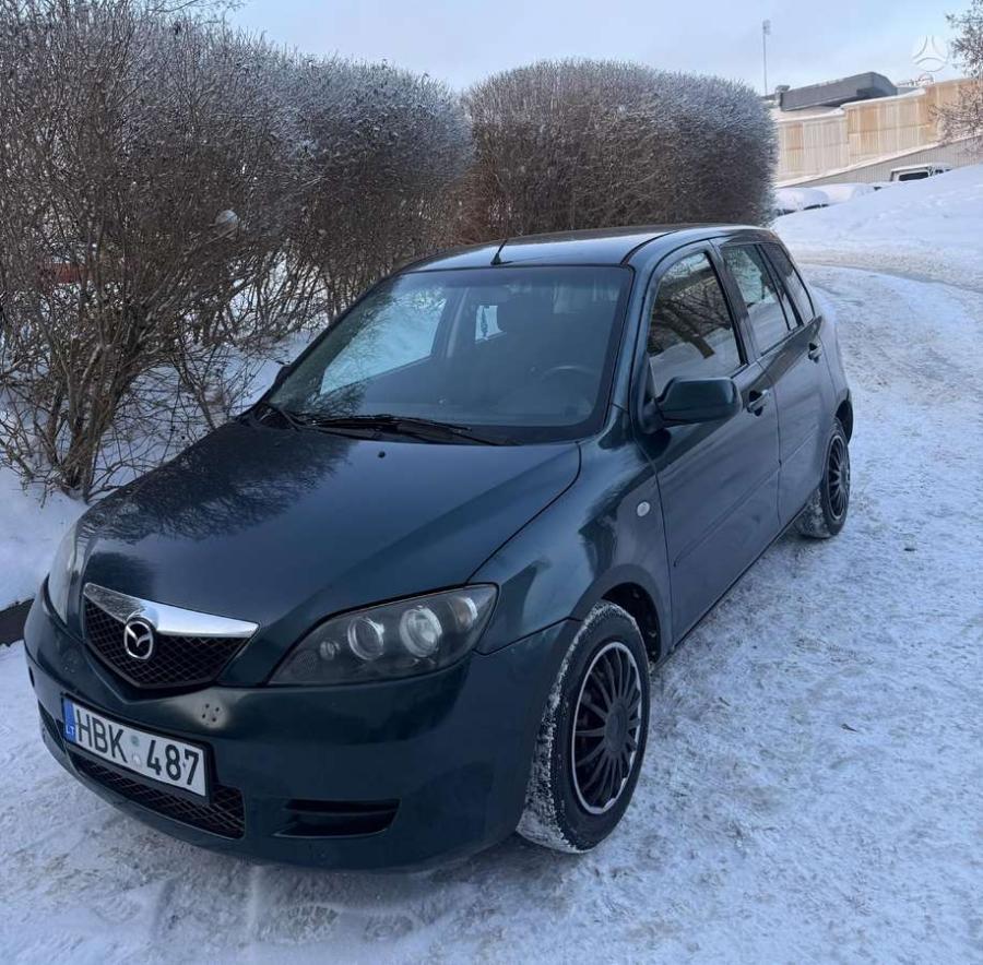 Green Mazda 2 2007 in Vilnius, with an engine capacity of 1.39 L and mileage of 218 thousand km for 1750 €, photo 1 on AUTOMOTO.COM.LV