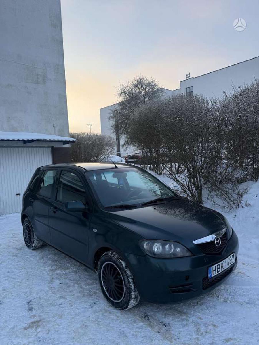 Green Mazda 2 2007 in Vilnius, with an engine capacity of 1.39 L and mileage of 218 thousand km for 1750 €, photo 2 on AUTOMOTO.COM.LV