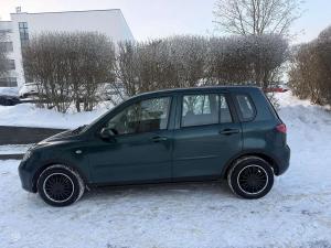 Green Mazda 2 2007 in Vilnius, with an engine capacity of 1.39 L and mileage of 218 thousand km for 1750 €, photo 3 on AUTOMOTO.COM.LV