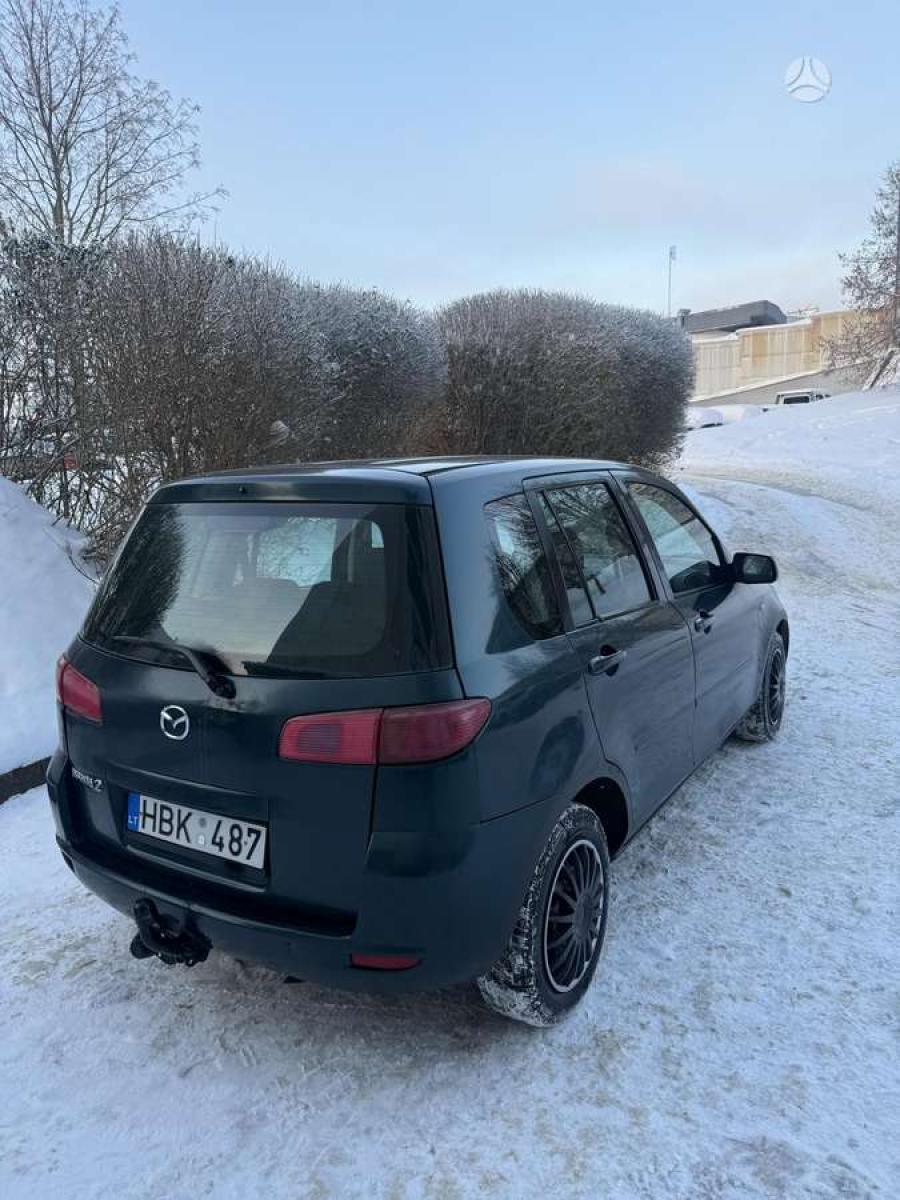 Green Mazda 2 2007 in Vilnius, with an engine capacity of 1.39 L and mileage of 218 thousand km for 1750 €, photo 6 on AUTOMOTO.COM.LV