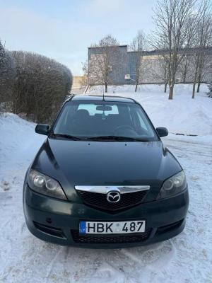 Green Mazda 2 2007 in Vilnius, with an engine capacity of 1.39 L and mileage of 218 thousand km for 1750 €, photo 7 on AUTOMOTO.COM.LV