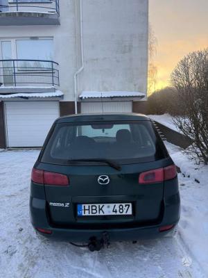 Green Mazda 2 2007 in Vilnius, with an engine capacity of 1.39 L and mileage of 218 thousand km for 1750 €, photo 8 on AUTOMOTO.COM.LV